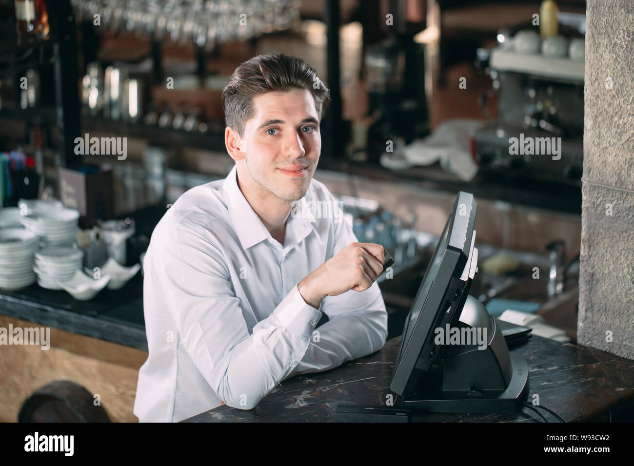 small business, people and service concept - happy man or waiter in ...