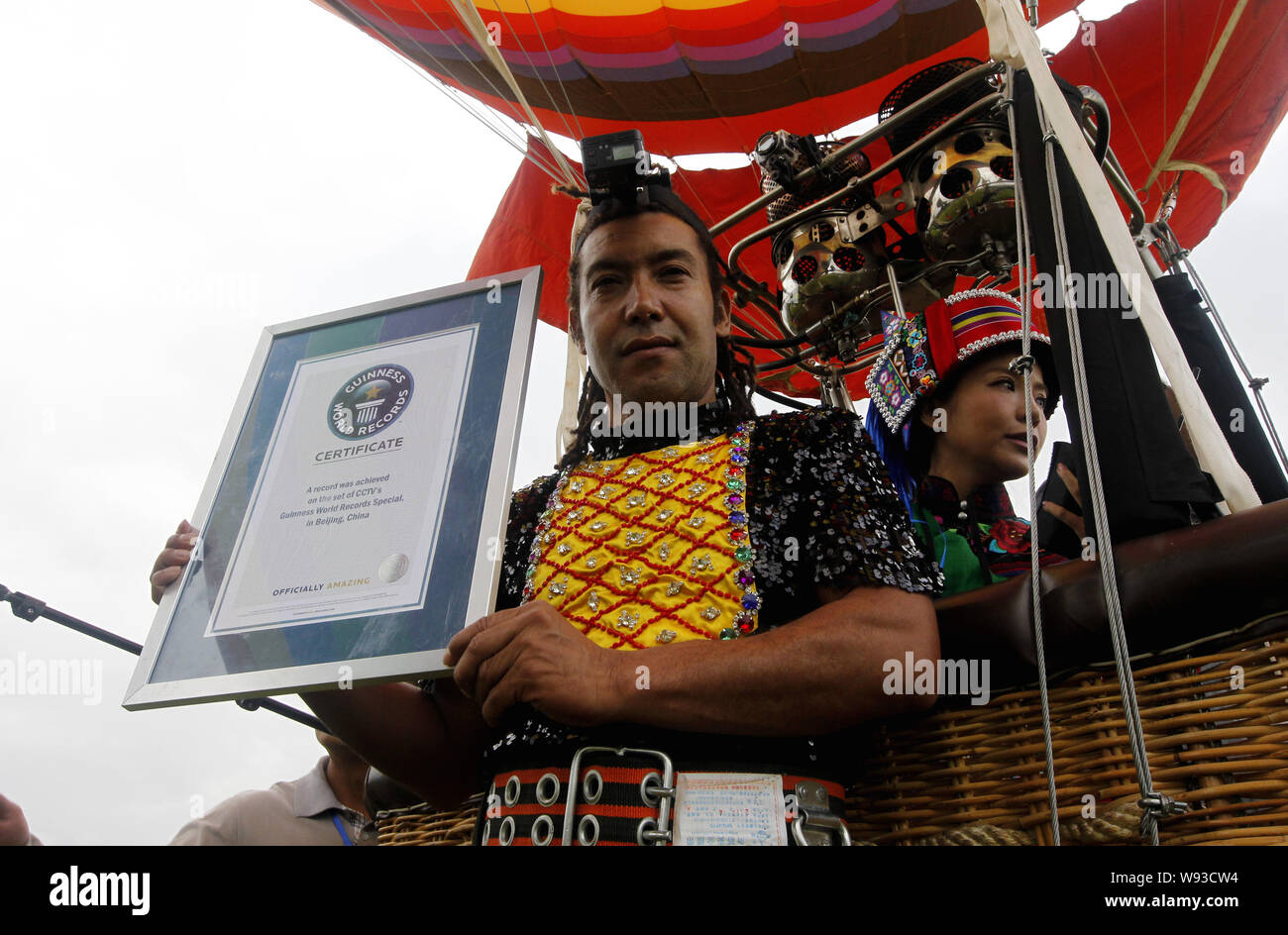Chinese Uighur tightrope walker Aisikaier Wubulikaisimu shows his ...
