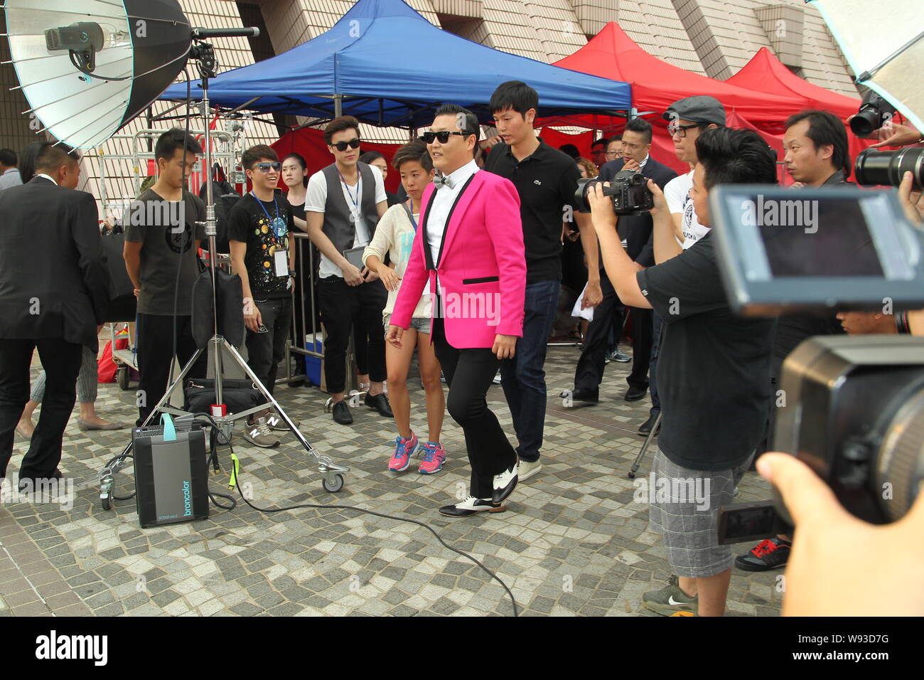 South Korean rapper Psy poses during a shooting of an advertisement for ...