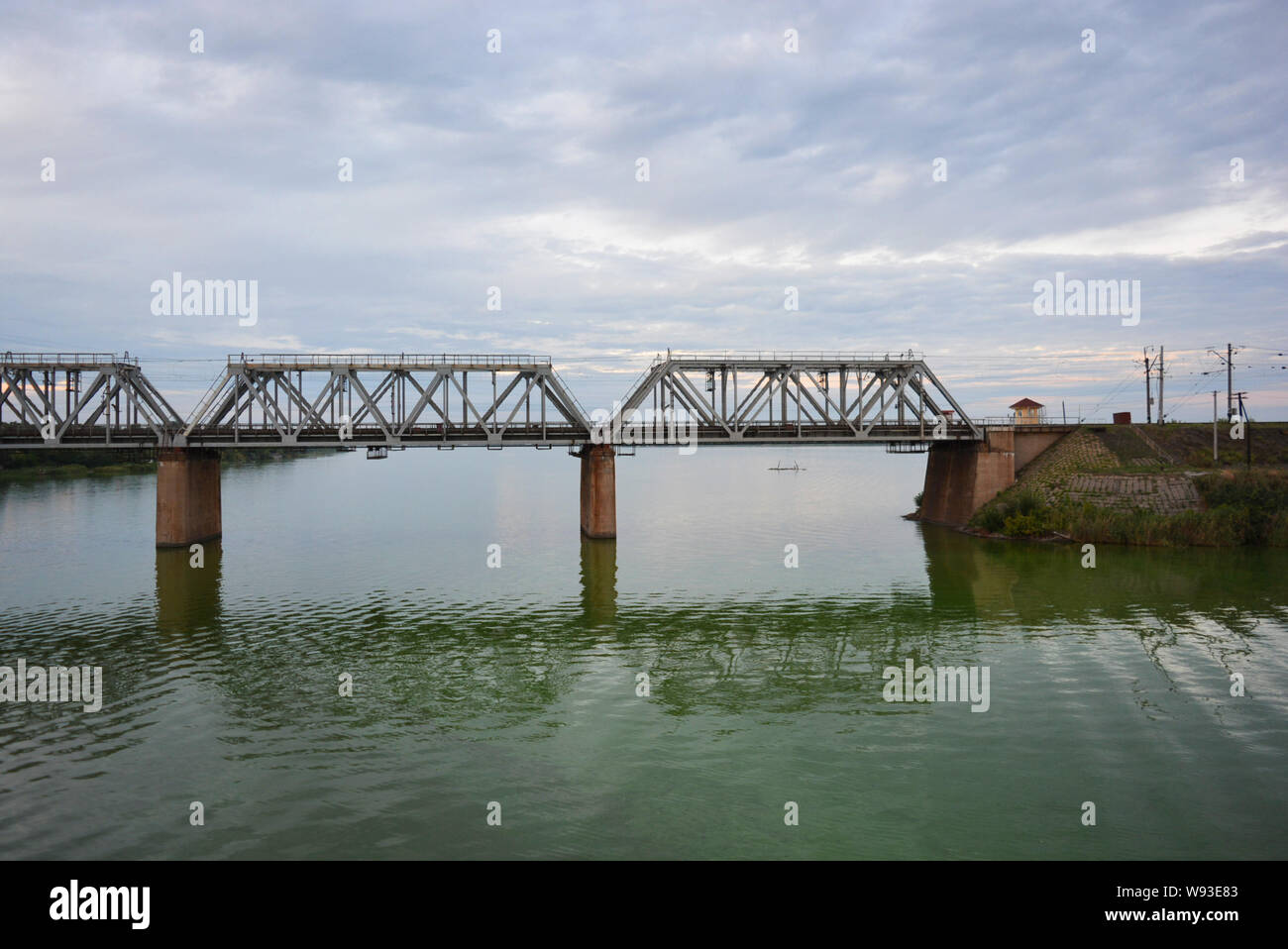 The gray Samara railway bridge over the surface of the Samara river ...