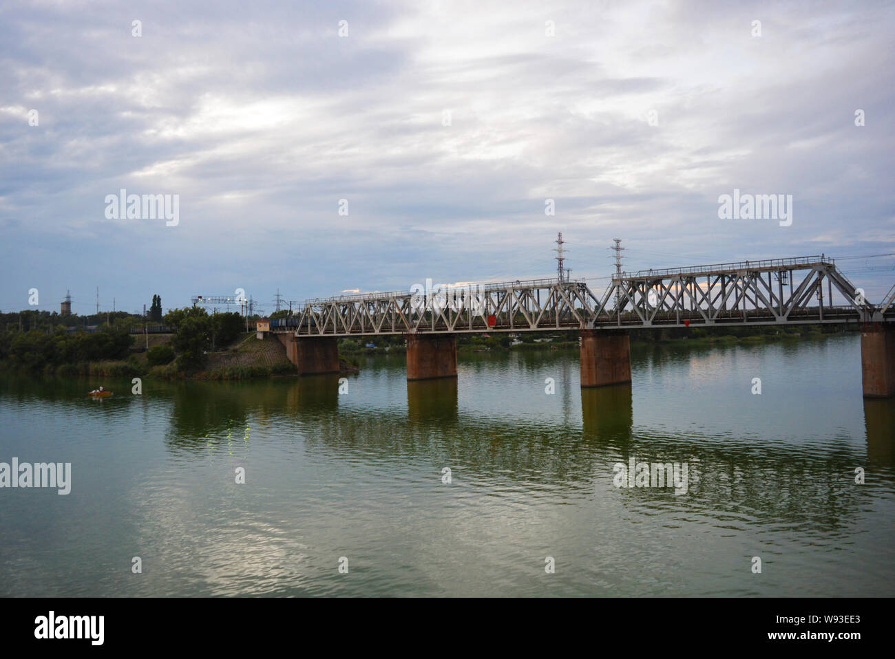 The gray Samara railway bridge over the surface of the Samara river ...