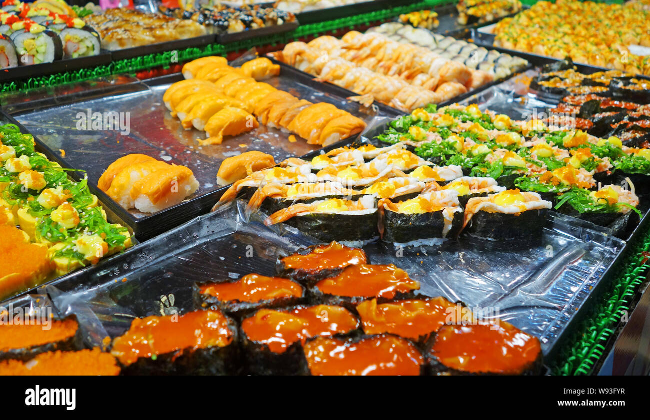 sushi japan food in street food market in thailand Stock Photo - Alamy