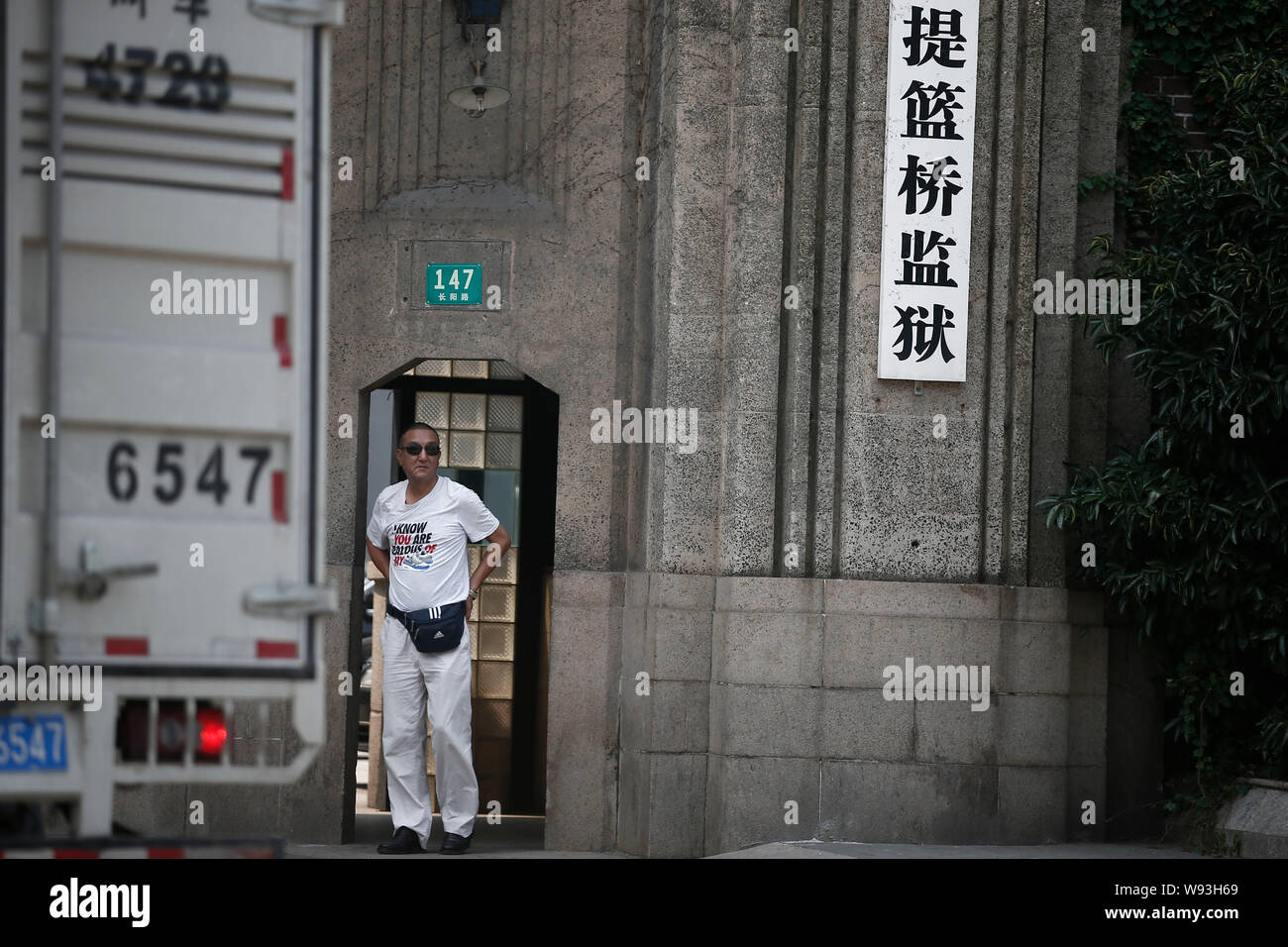 A Chinese man walks out from Tilanqiao Prison in downtown Shanghai ...