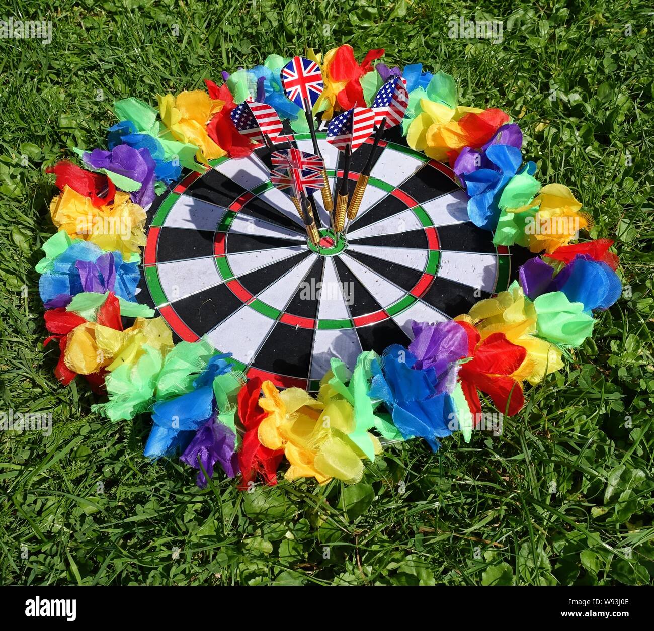 photography of darts with colored crown Stock Photo - Alamy