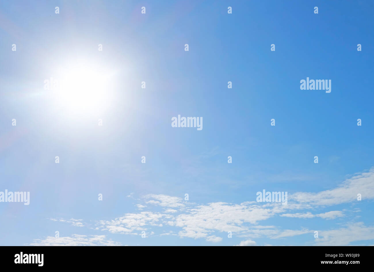 a bright sky with a cloud background Stock Photo - Alamy