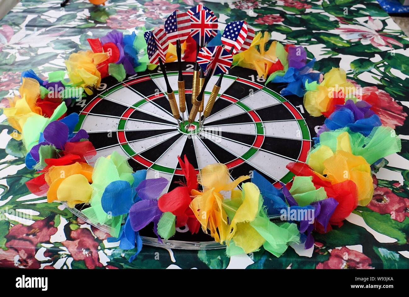photography of darts with colored crown Stock Photo - Alamy