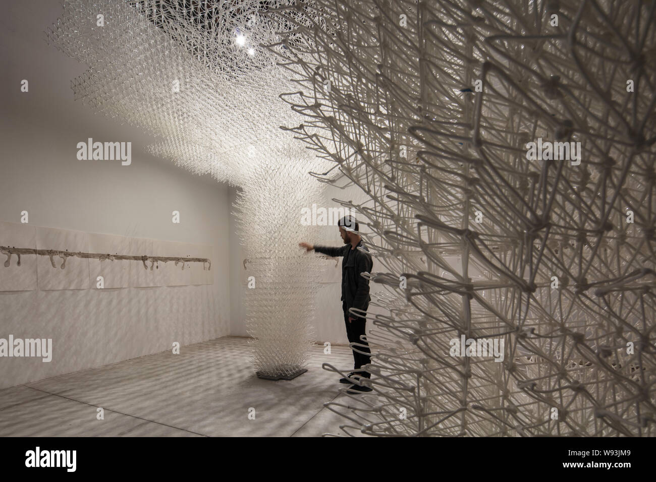 3D structure - lit from above and glowing with figure. Cloud Pergola at Venice Biennale 2018 ...
