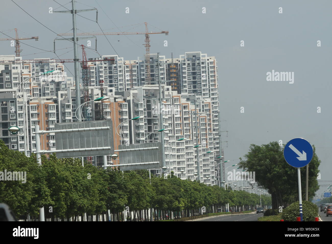 --FILE--New high-rise residential apartment buildings are under construction in Nantong, east ...