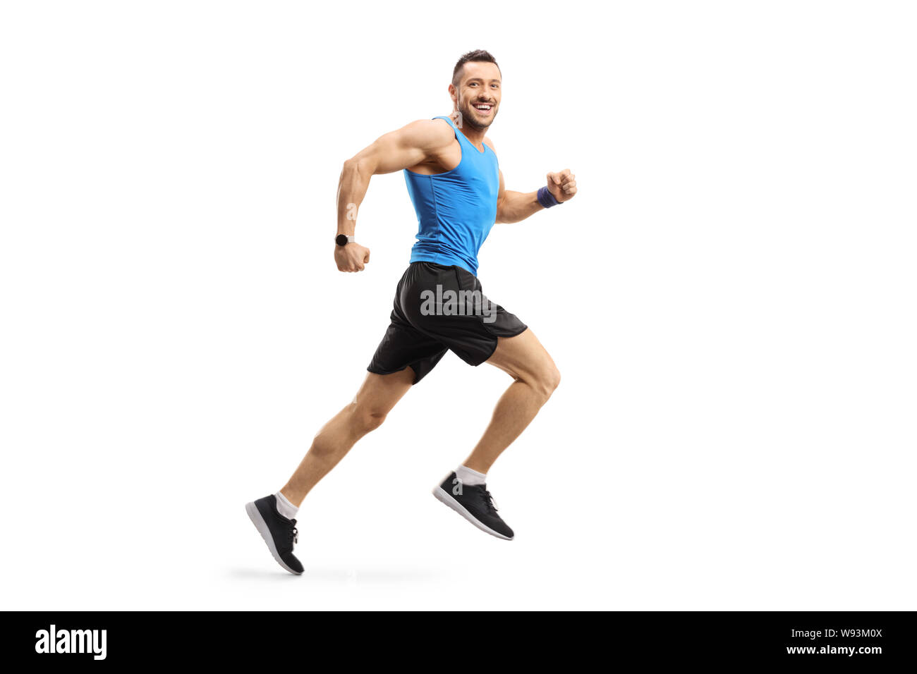 Muscular male runner running hi-res stock photography and images - Alamy