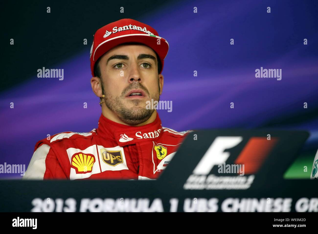 Spanish F1 driver Fernando Alonso of Ferrari attends a press conference ...