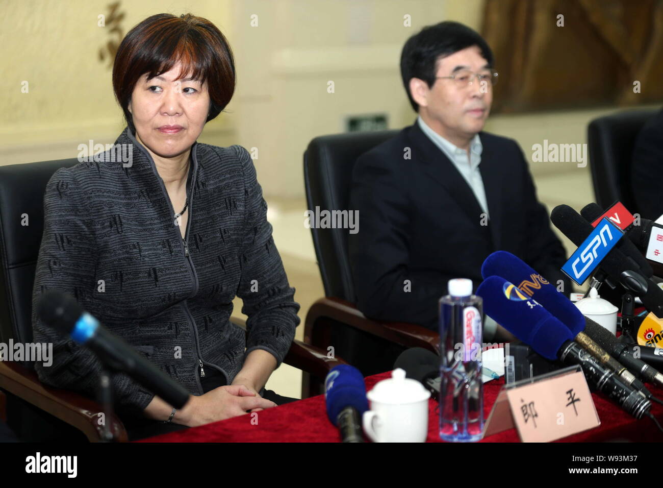 Lang Ping (left), also known as Jenny Lang, looks on at the the press ...