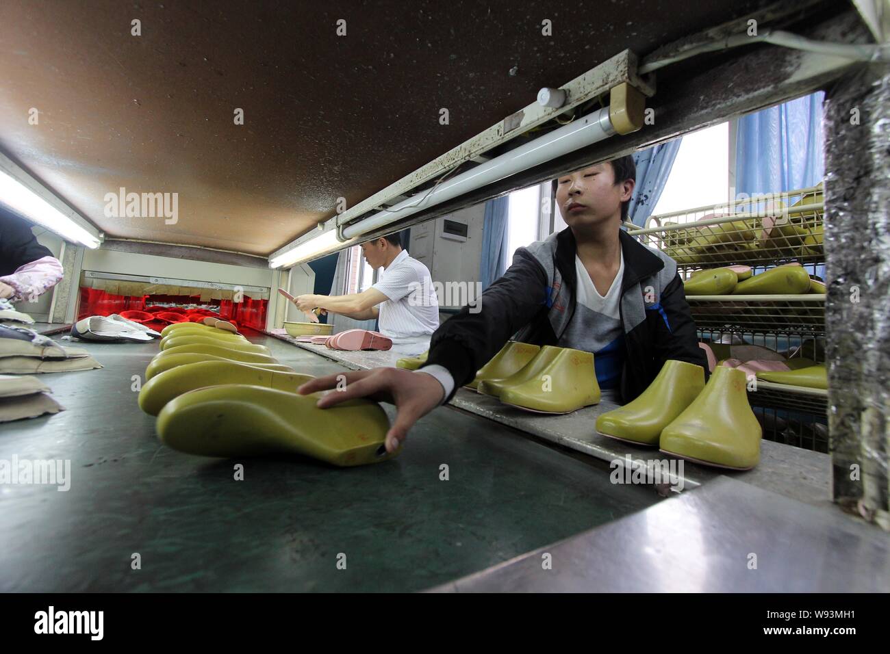 Sports shoe manufacturing plant hi-res stock photography and images - Alamy