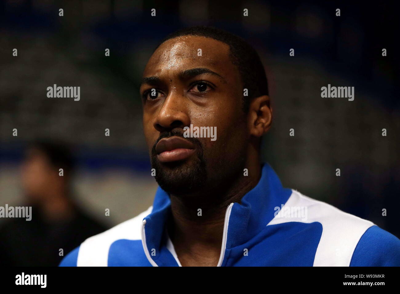 Gilbert Arenas of the Shanghai Sharks looks on during the warm-up ...