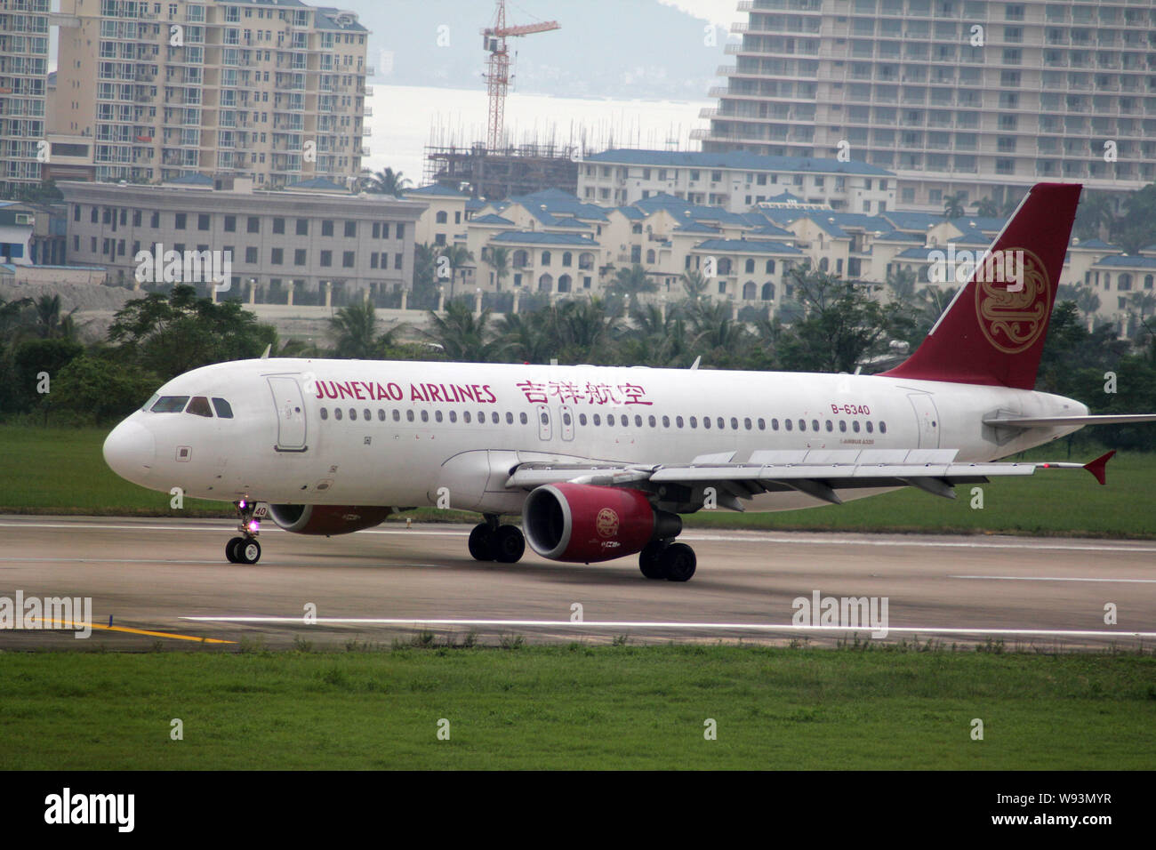 --FILE--A plane of Juneyao Airlines is pictured at the Sanya Phoenix ...