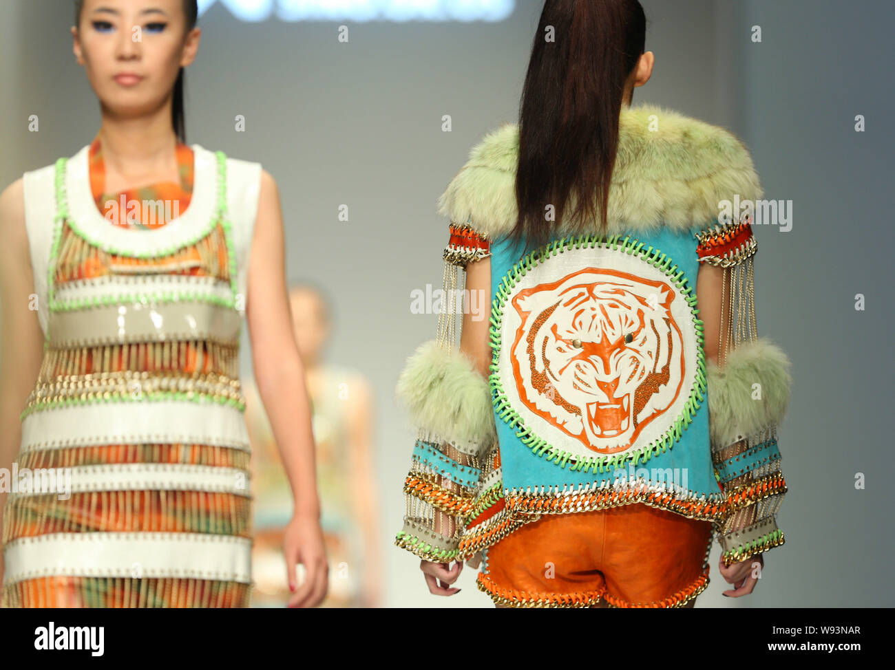 Models display a new creation at the VIEW fashion show during the ...