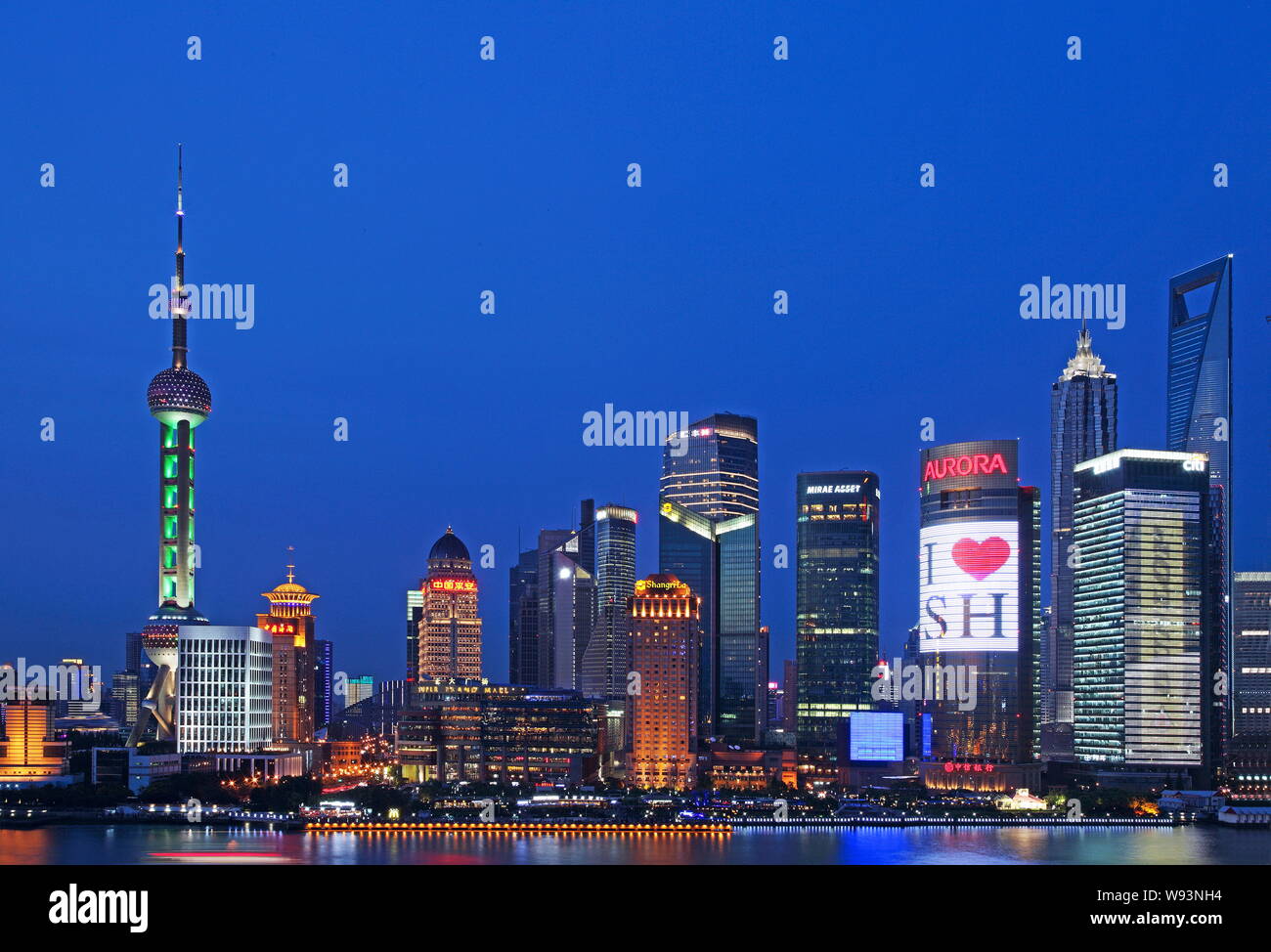 --FILE--Night view of the Oriental Pearl TV Tower, left, and other ...