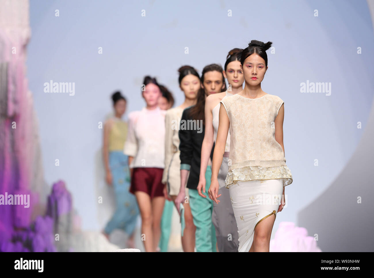 Models display new creations by female Chinese designer Ji Cheng at her ...