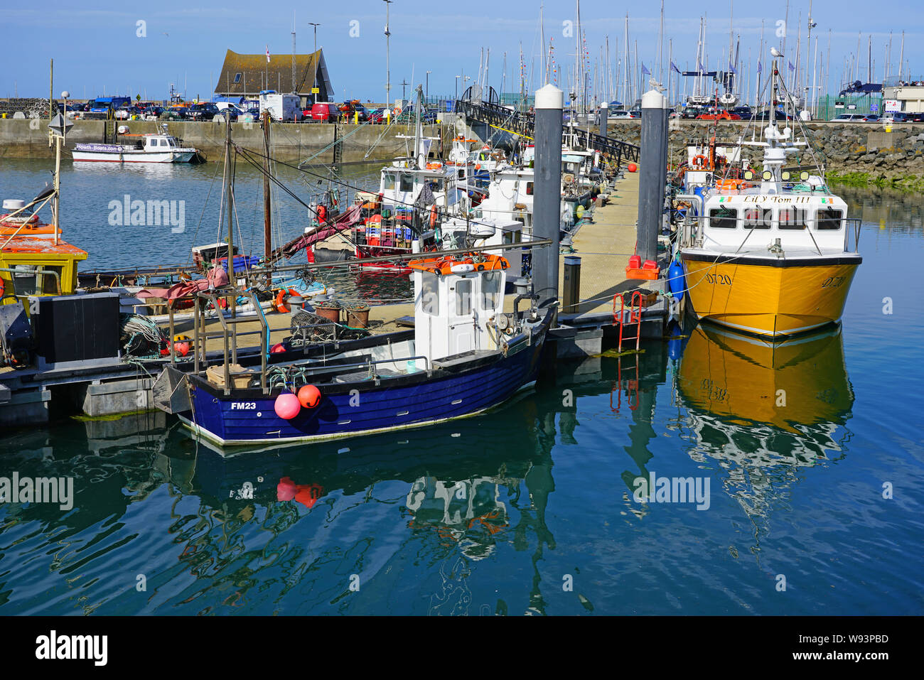 HOWTH, IRELAND- 27 JUL 2019- Colorful sailboats in Howth, a fishing ...
