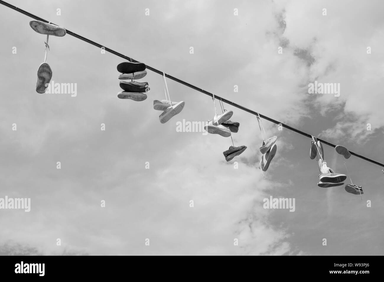 Shoes on cable hi-res stock photography and images - Alamy