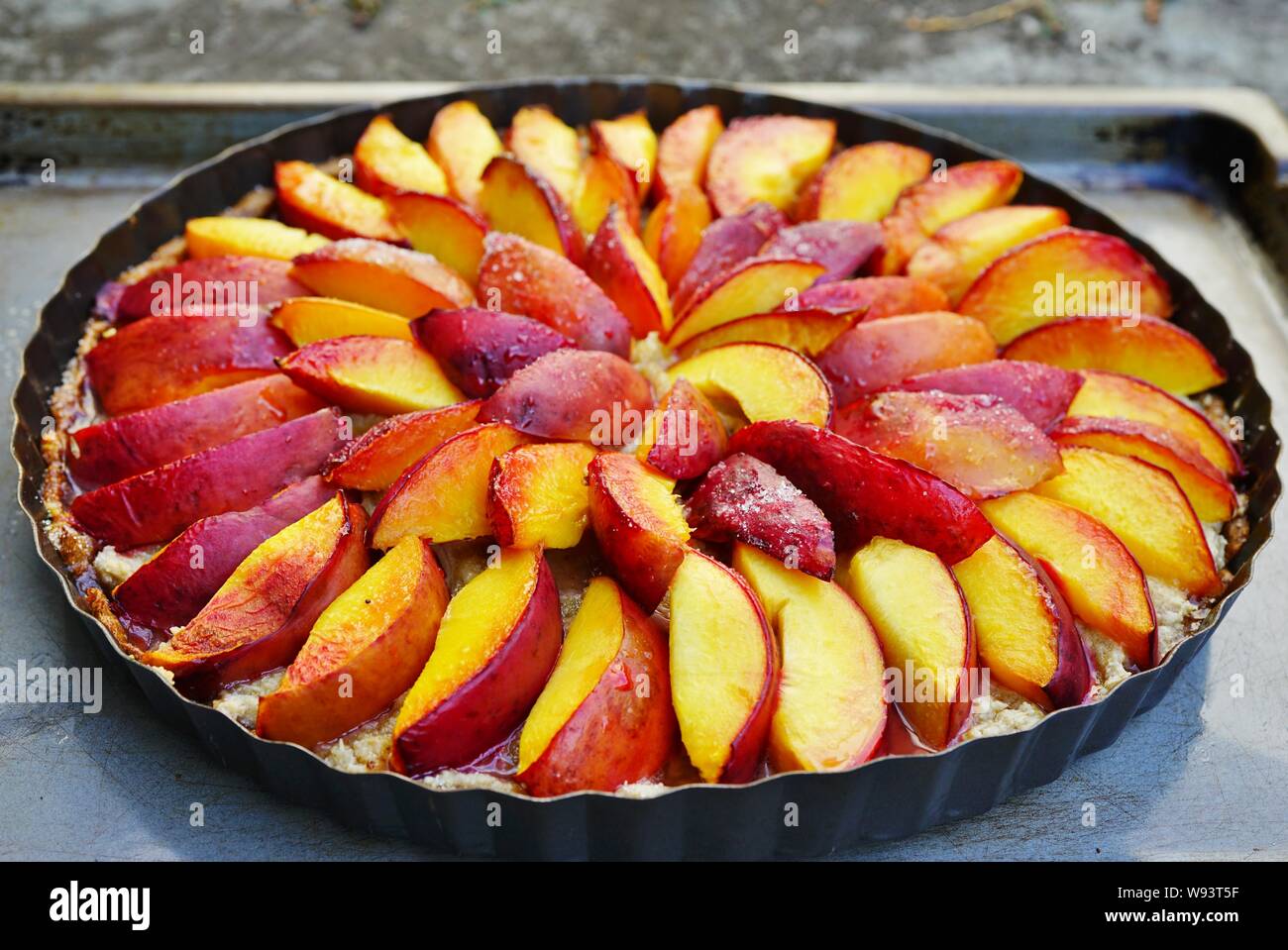 Homemade vegan fruit tart with nectarines and frangipane almond cream ...