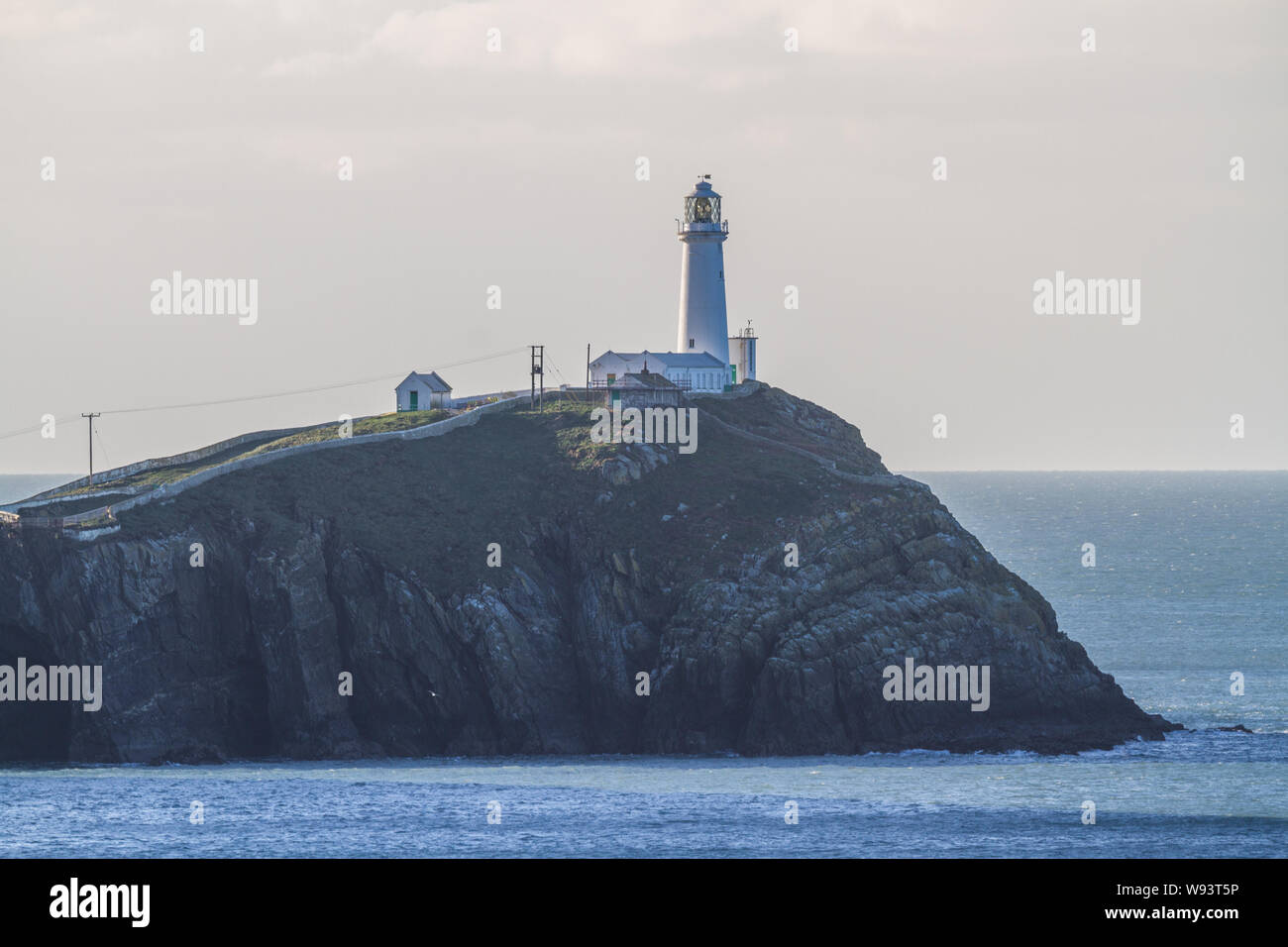 South Stack rock and lighthouse from the North. Holyhead, Anglesey ...