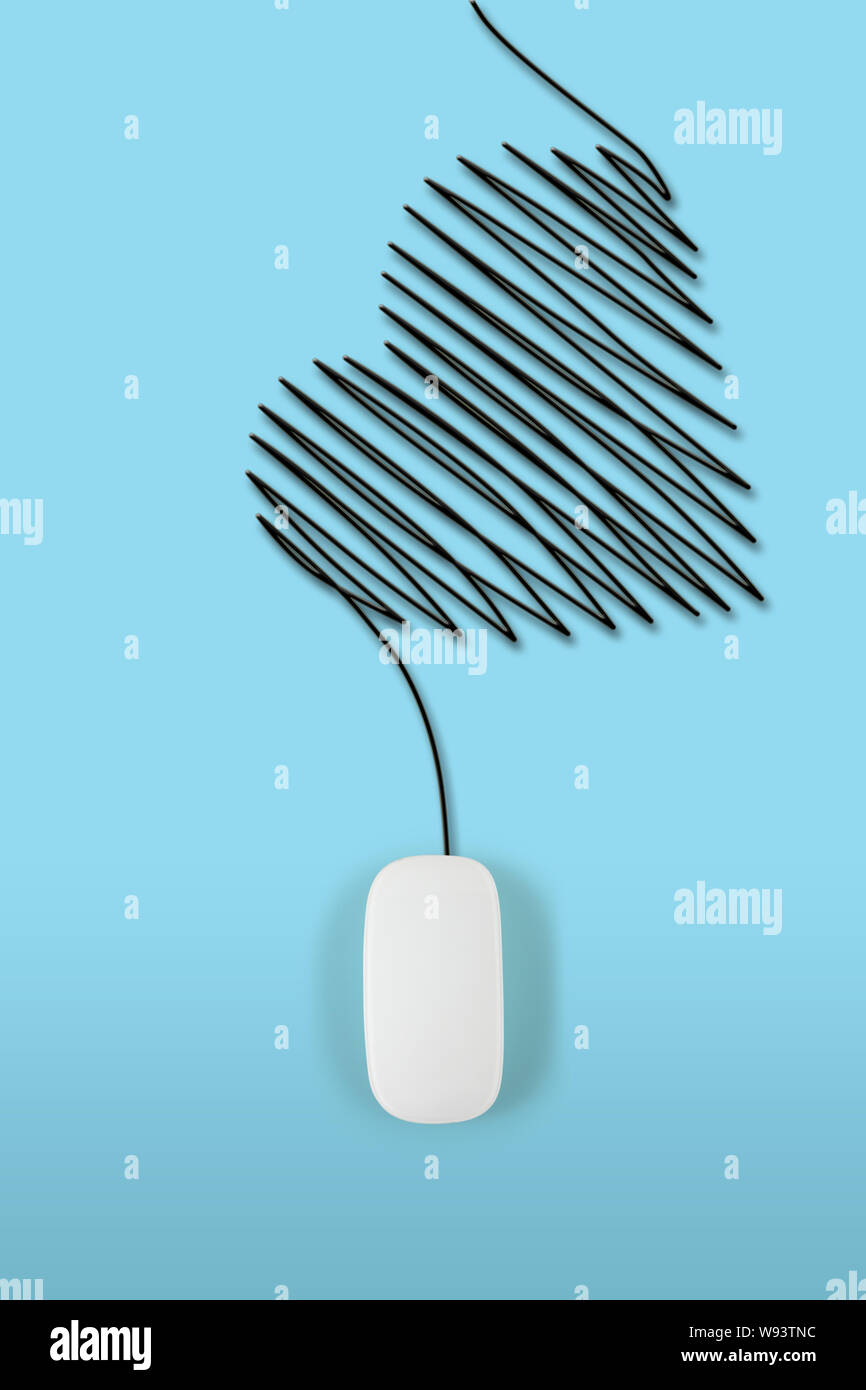 Computer mouse with its wire making a heart shape symbol Stock Photo ...