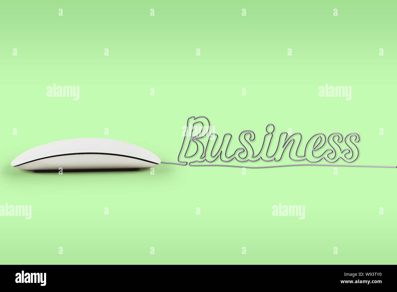 Computer mouse with its wire making a word business Stock Photo - Alamy