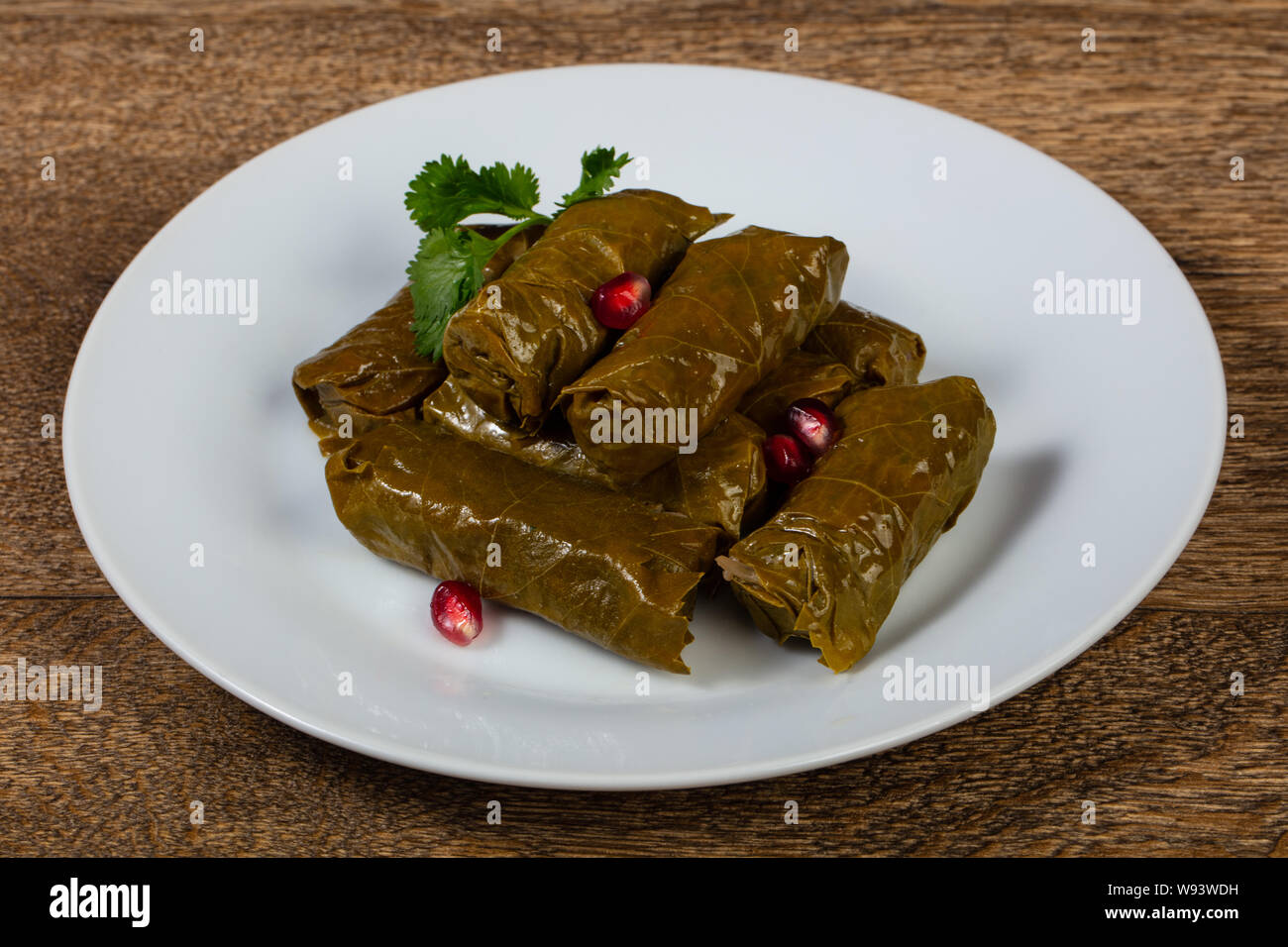Caucasian traditional Dolma - minced meat in grape leaves Stock Photo ...