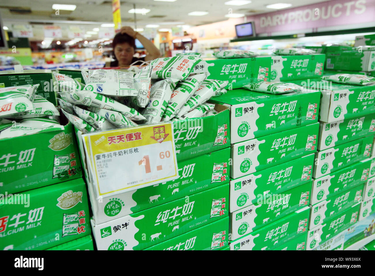 --FILE--Cartons of Mengniu pure milk are for sale at a supermarket in ...