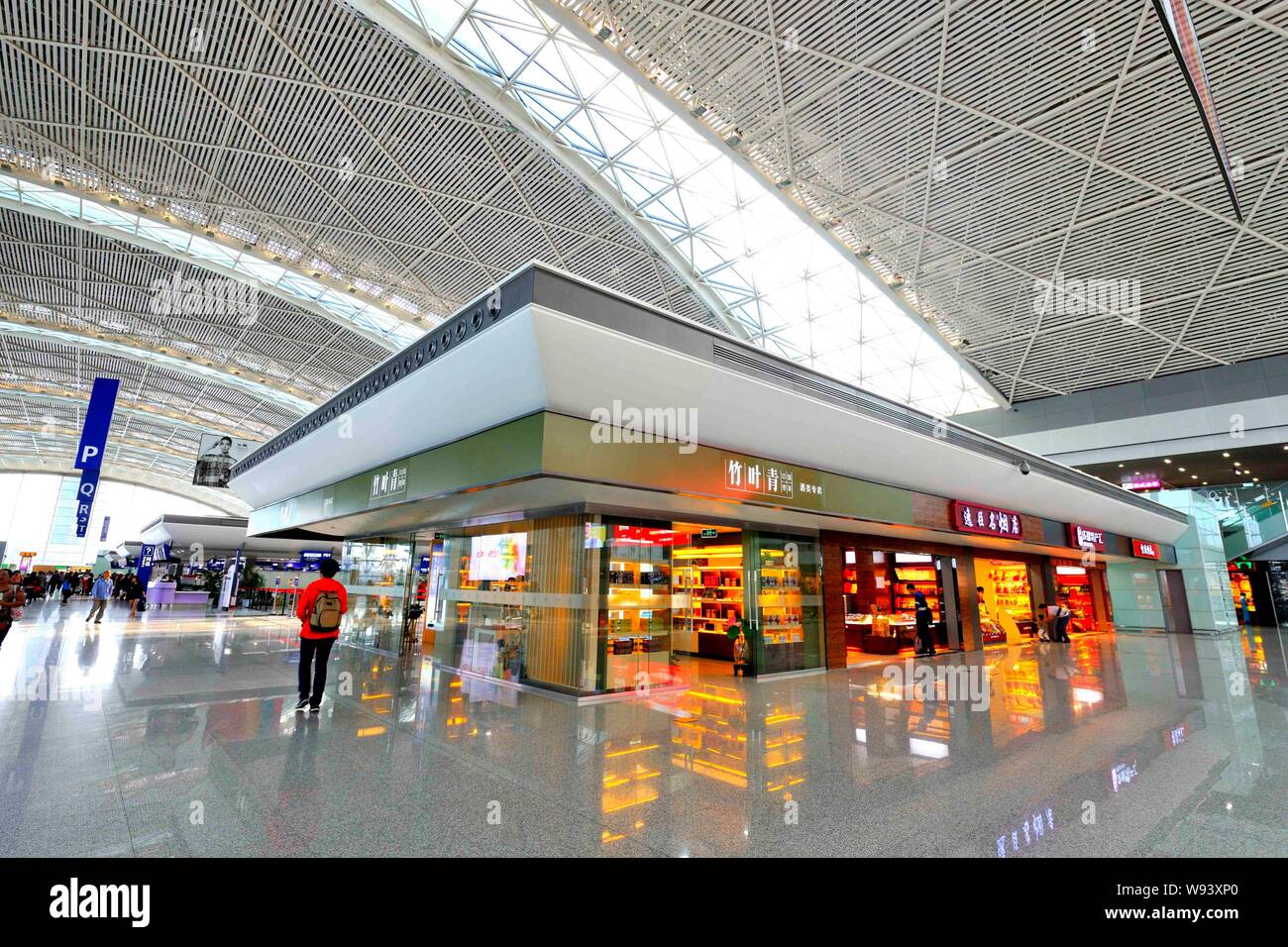 --FILE--Passengers are seen at the new terminal building of Chengdu ...