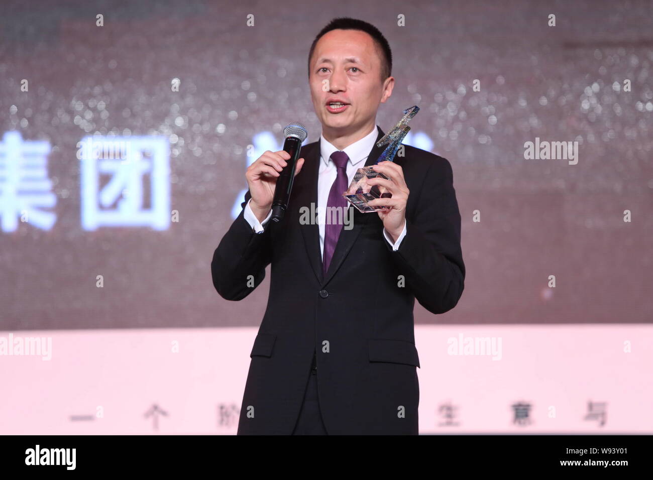 --FILE--Yu Liang, CEO of China Vanke Co. Ltd, speaks as he holds a ...