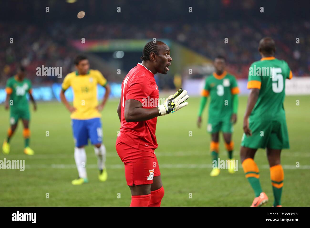 Goalkeeper Kennedy Mweene of Zambia, front, speaks to his teammates in ...