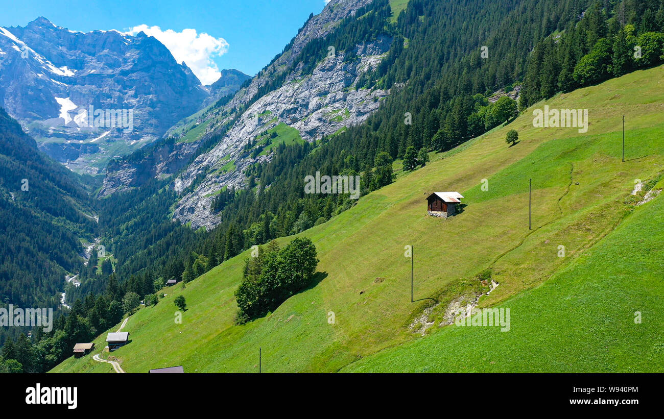 The village of Gimmelwald in the Swiss Alps - aerial view - aerial ...