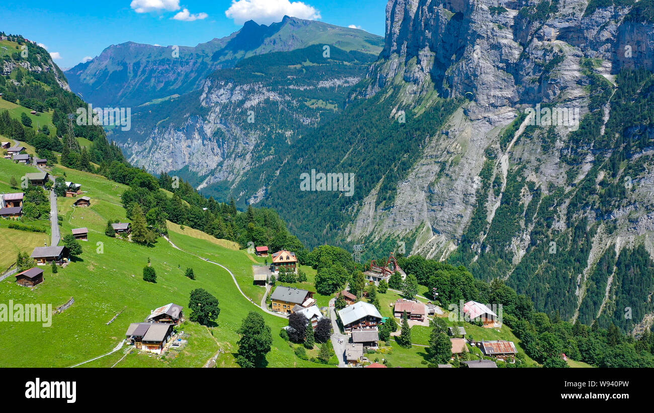 The village of Gimmelwald in the Swiss Alps - aerial view - aerial ...