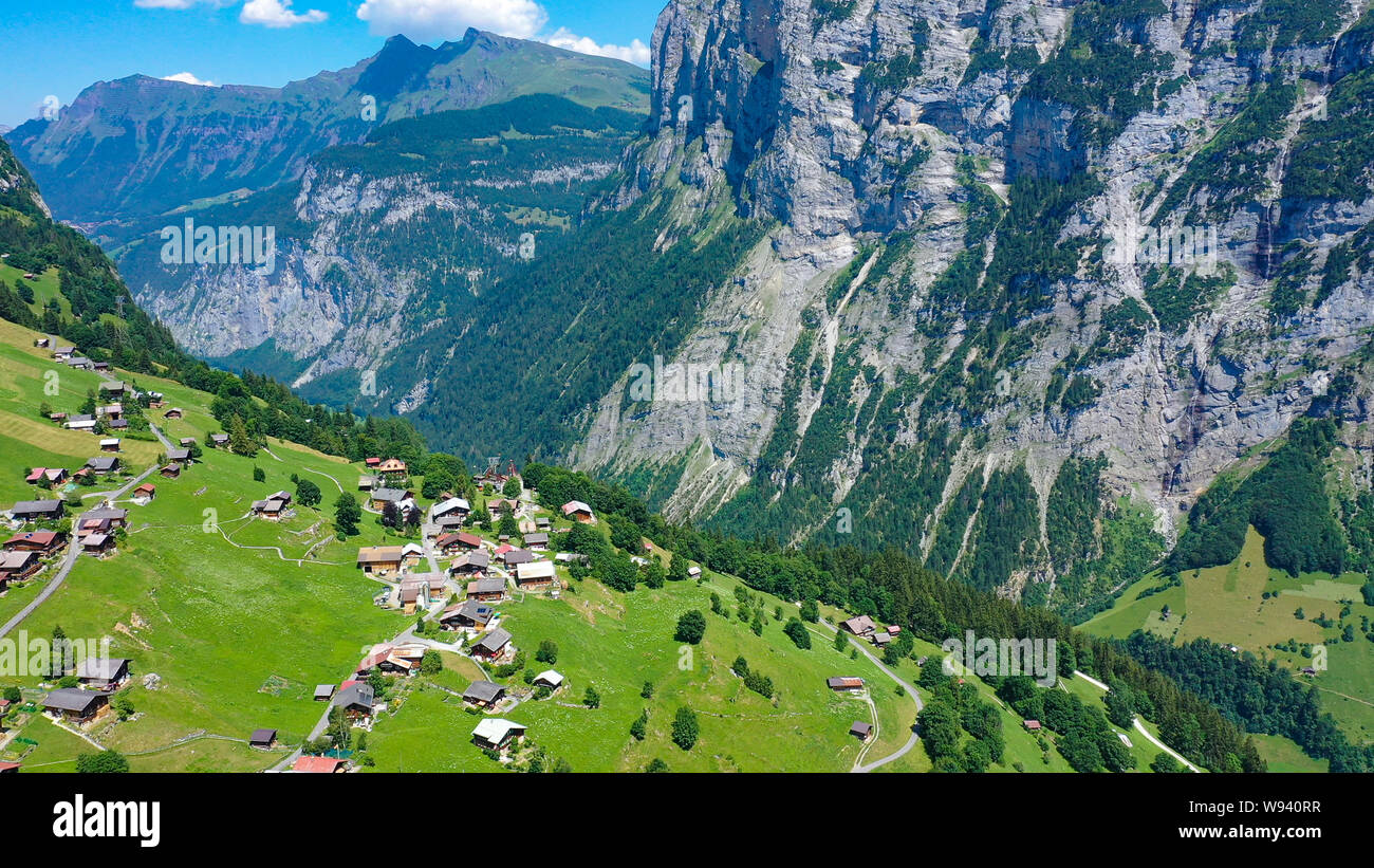 The village of Gimmelwald in the Swiss Alps - aerial view - aerial ...
