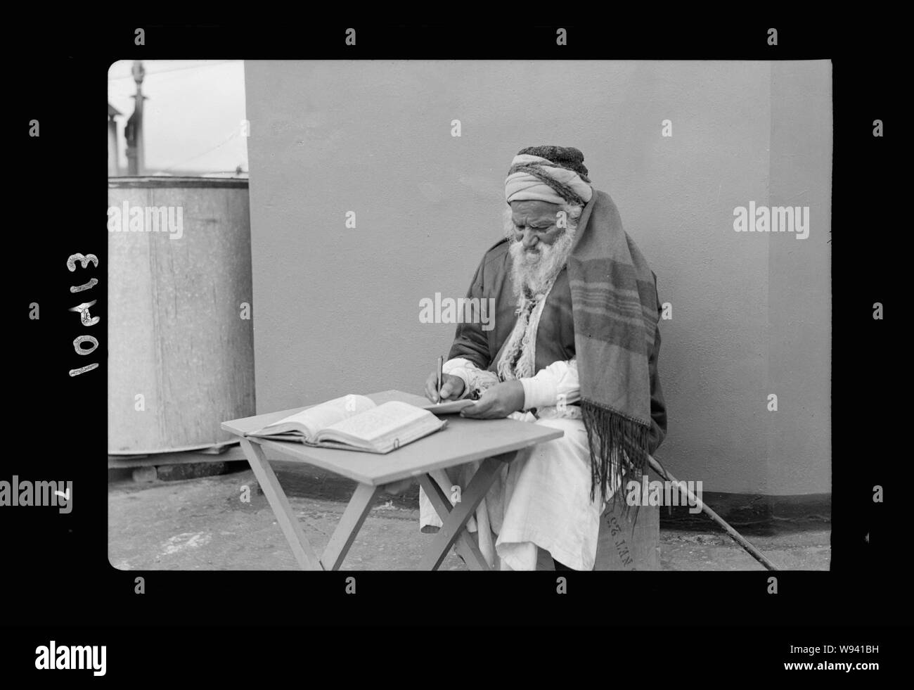 Hand writing in book Black and White Stock Photos & Images - Alamy