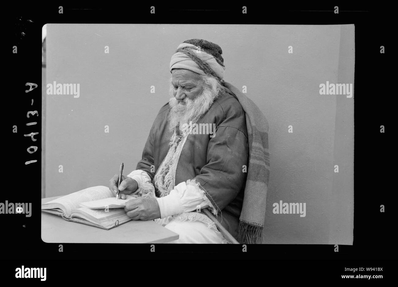 Hand writing in book Black and White Stock Photos & Images - Alamy