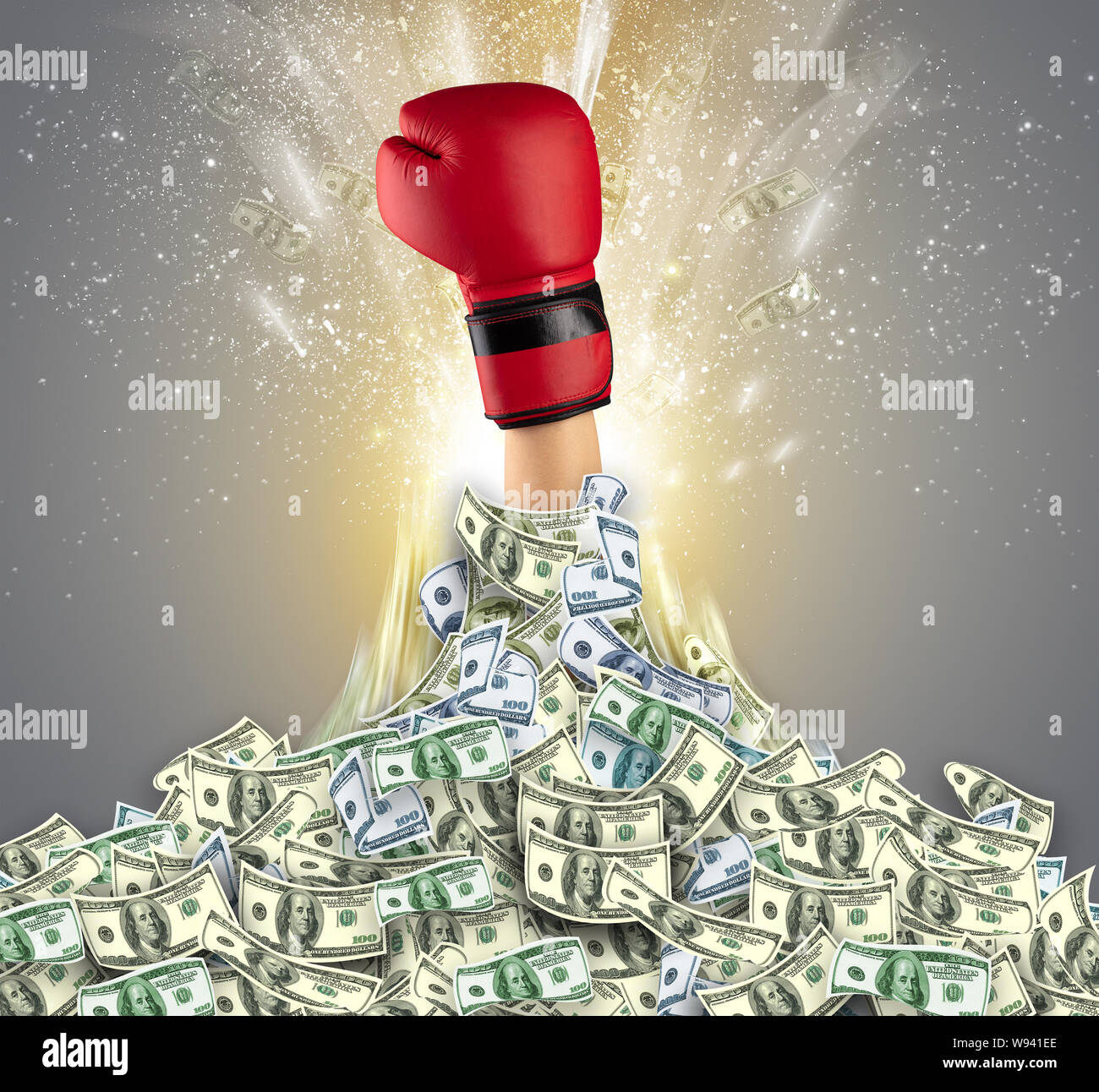 Hand bursting from a huge money pile Stock Photo - Alamy