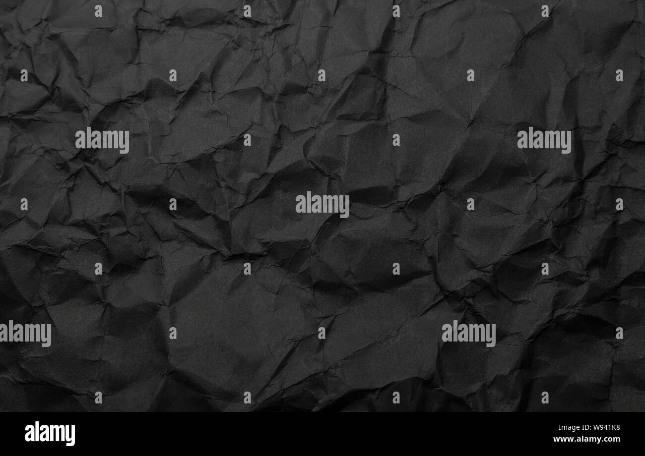 Texture of black crumpled paper. Dark paper background with chaotic ...