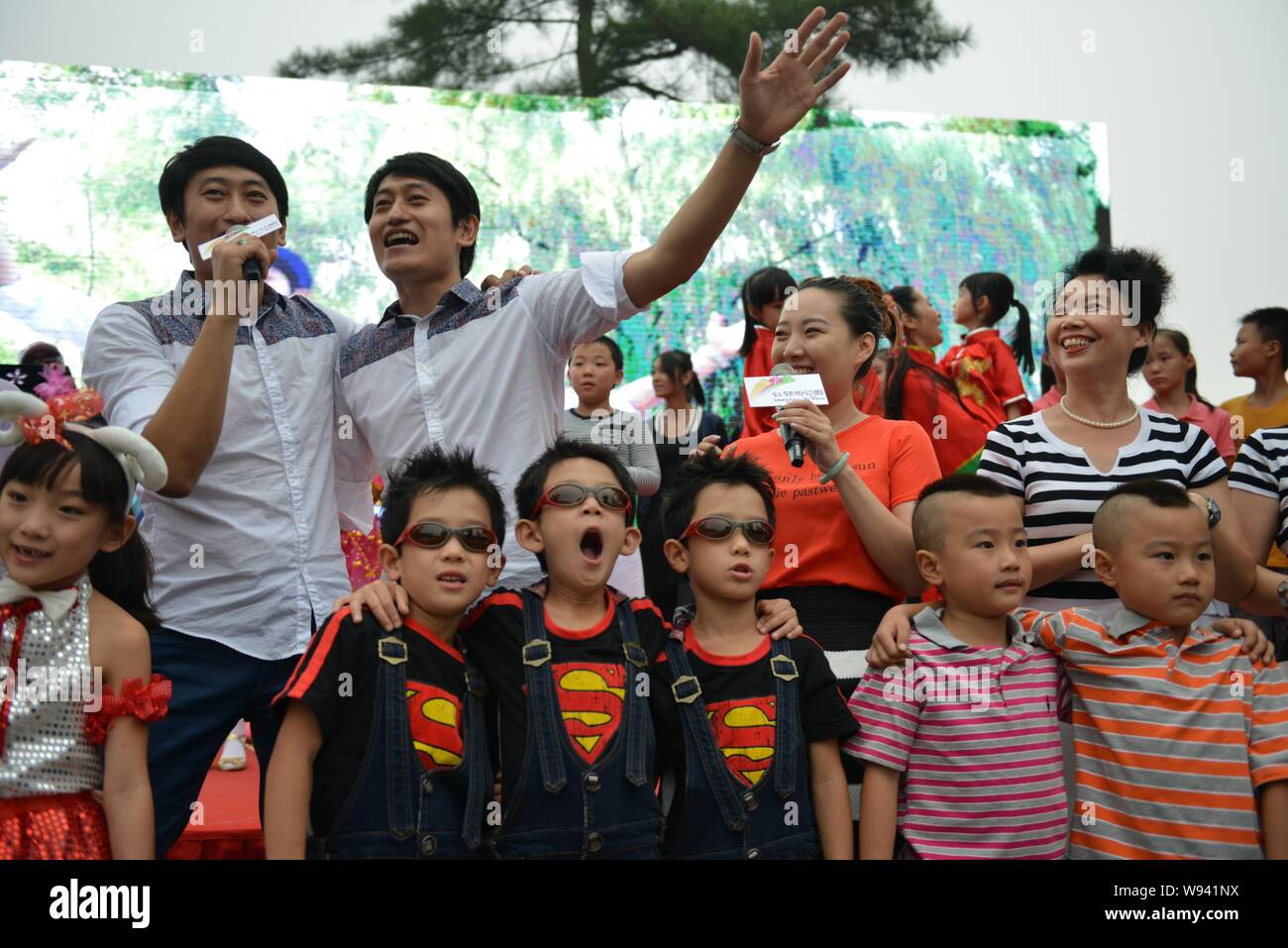 Chinese twins and triplets attends the launch ceremony of the 10th ...