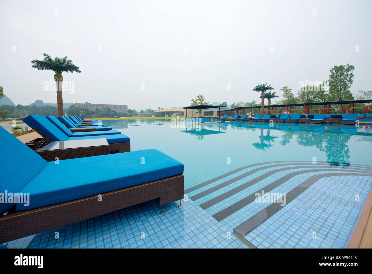 View of an outdoor swimming pool at Club Med Guilin resort in Yangshuo ...