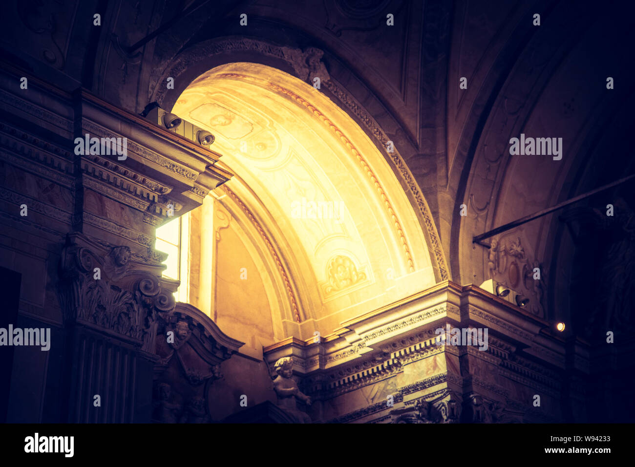 Light is coming through: Light beams through a historic church window ...