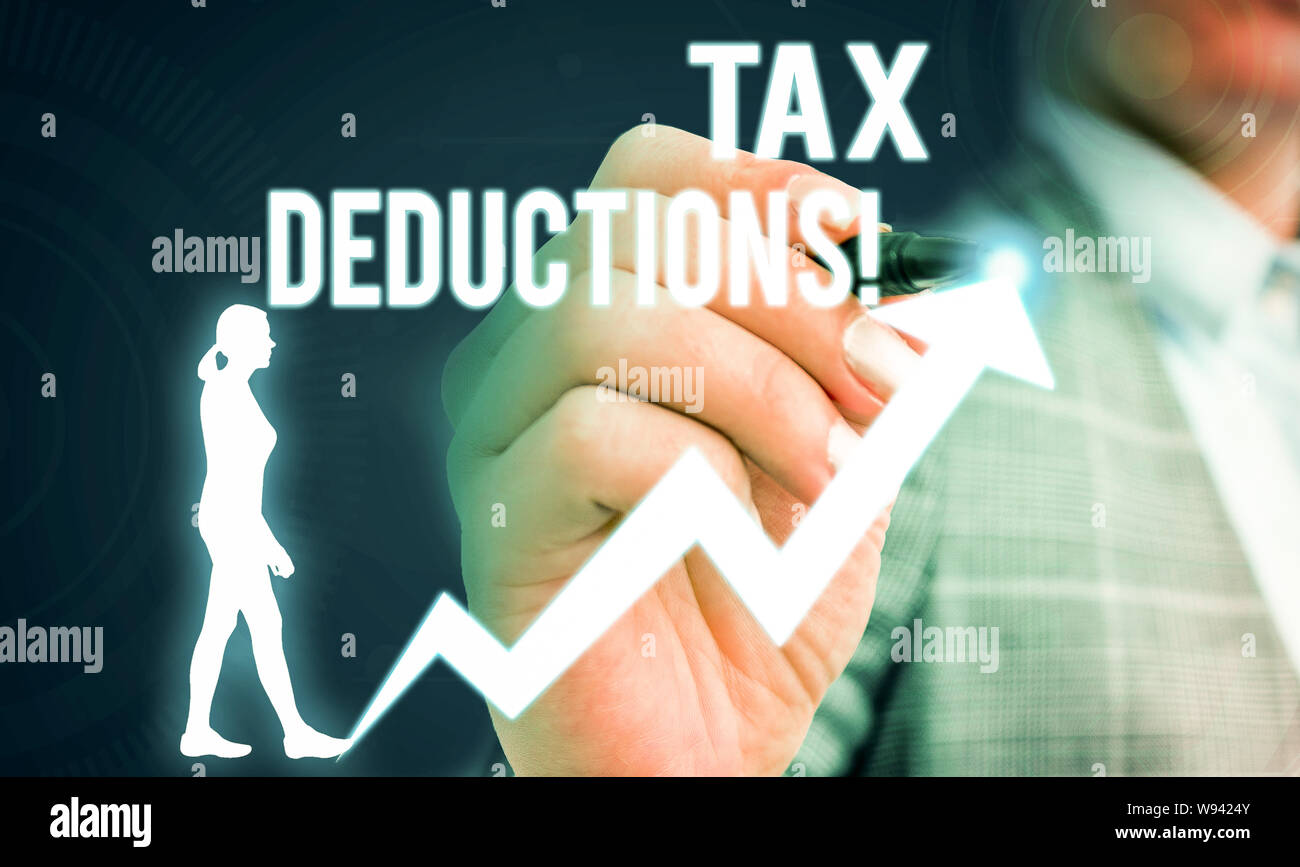 Handwriting text writing Tax Deductions. Conceptual photo reduction ...