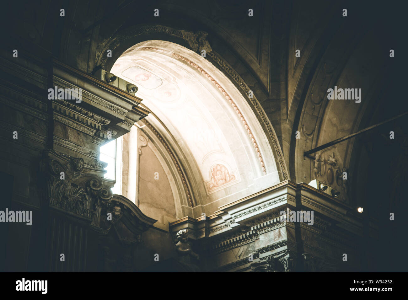 Light is coming through: Light beams through a historic church window ...
