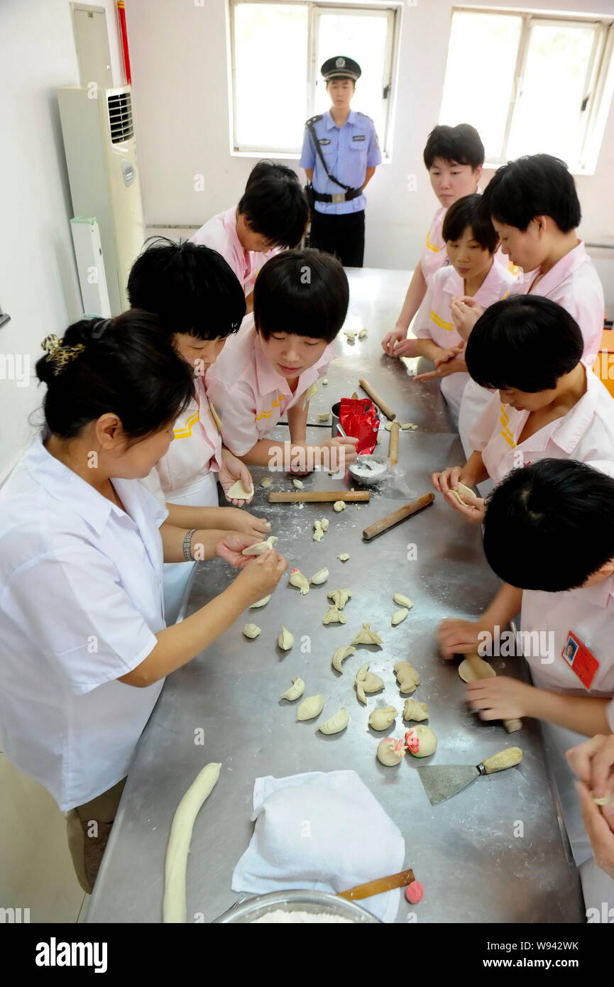 --FILE--Chinese inmates learn to make dim sum at a female labor camp in ...