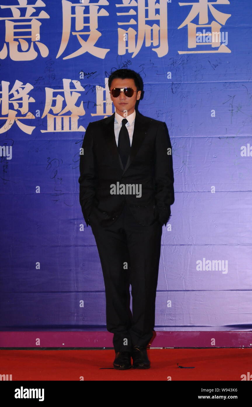 Hong Kong actor Nicholas Tse poses after winning the Best Actor in ...