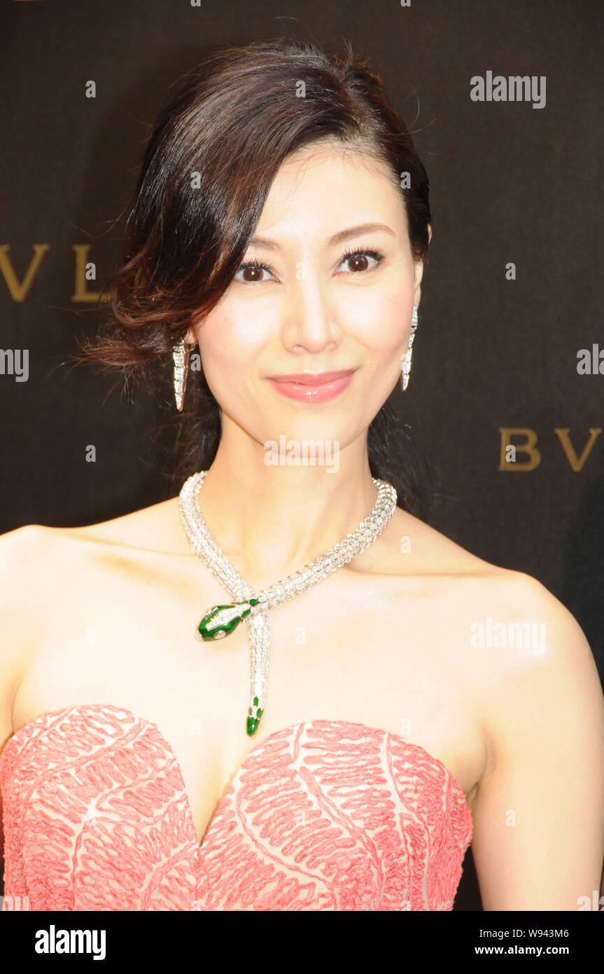 Hong Kong actress Michelle Lee smiles at a ribbon-cutting ceremony of Bulgari flagship store re ...