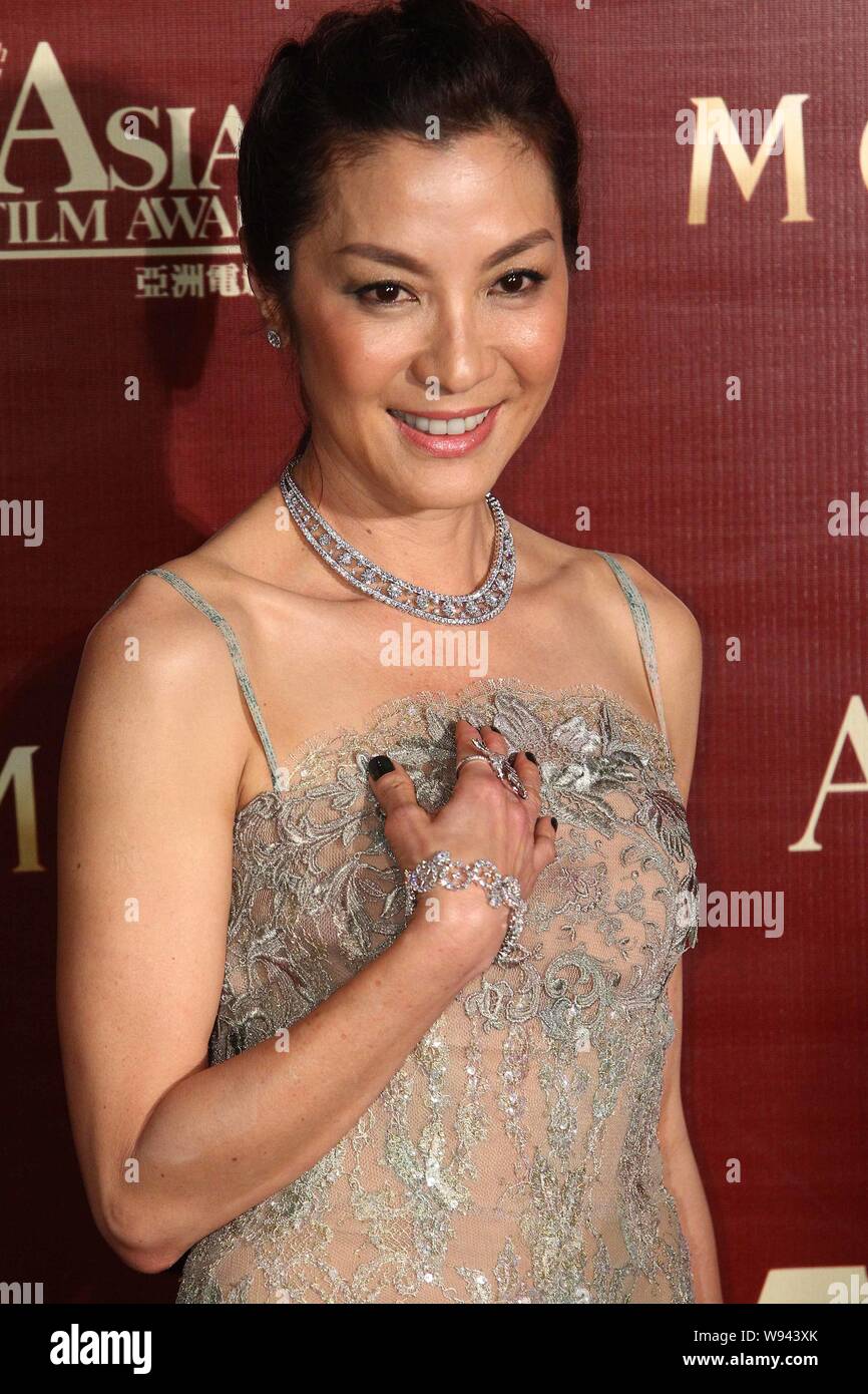 Malaysian actress Michelle Yeoh poses on the red carpet as she arrives ...