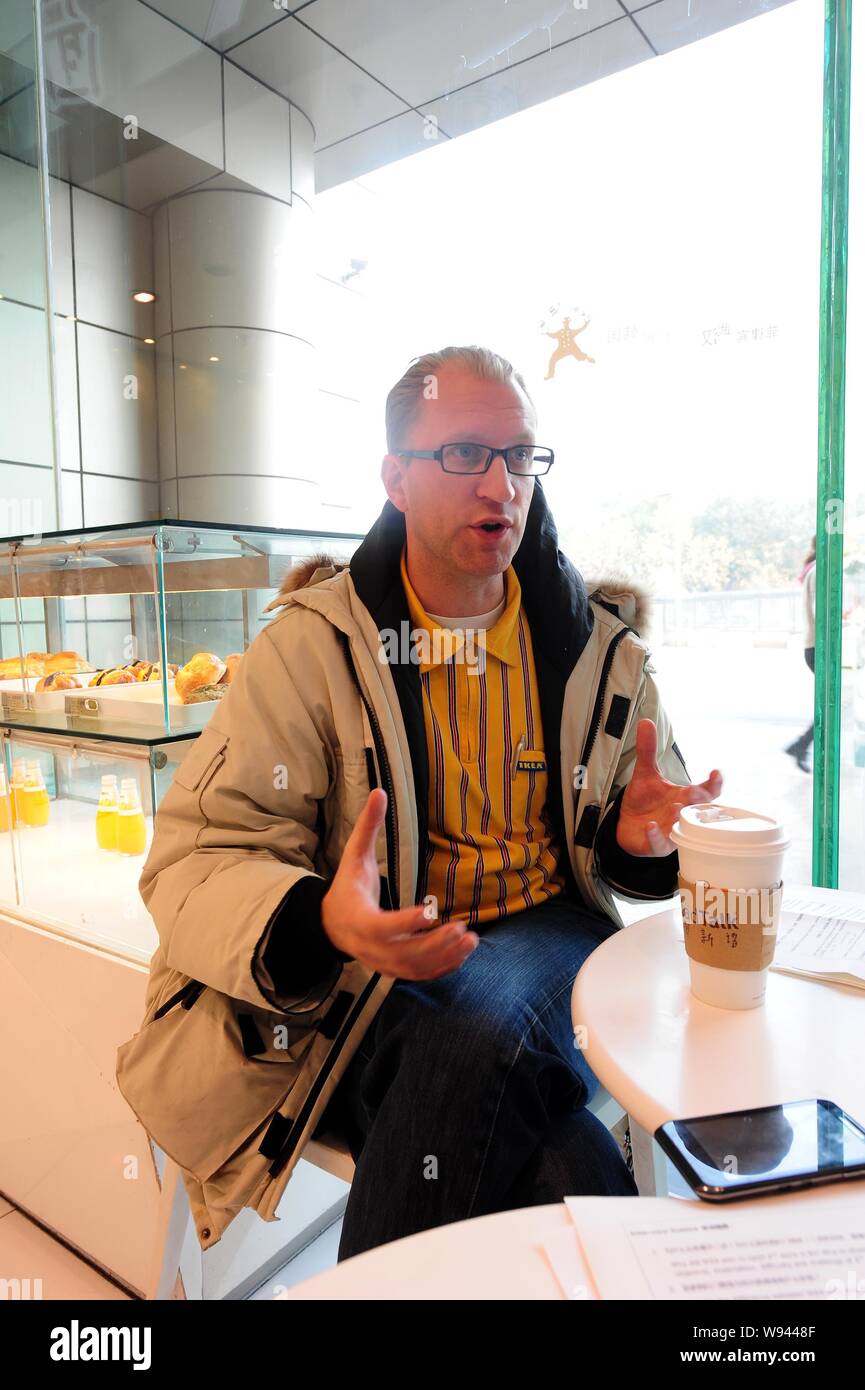 Fredrik C Johansson, the new Beijing IKEA store manager, speaks at an ...