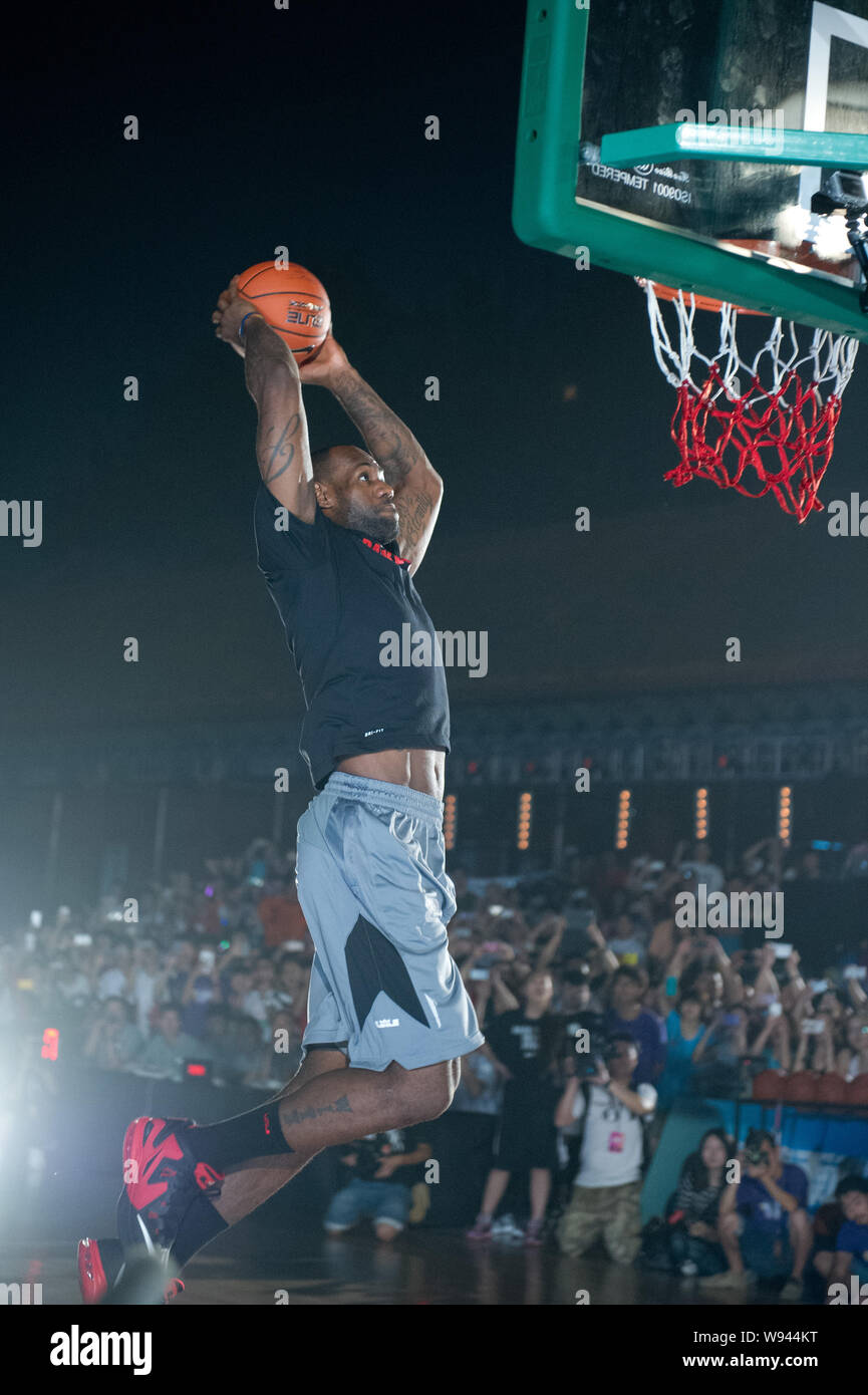 NBA super star LeBron James of the Miami Heat dunks during a fan ...